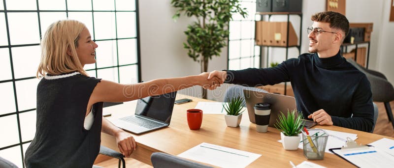 Two Business Workers Smiling Happy Shaking Hands at the Office Stock ...
