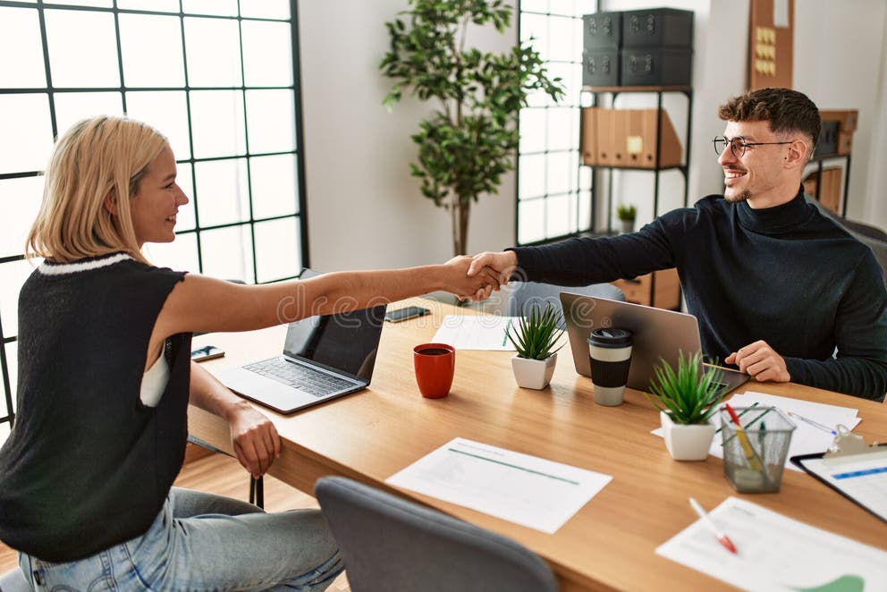 Two Business Workers Smiling Happy Shaking Hands at the Office Stock ...