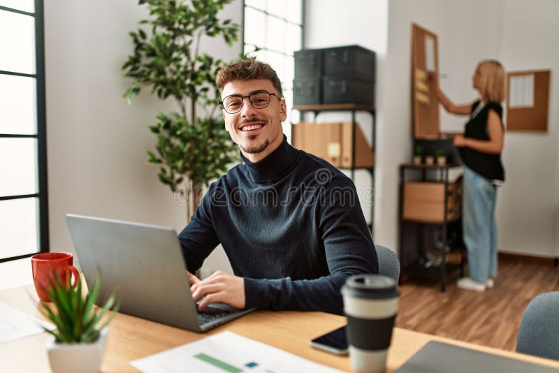 Two Business Workers Smiling Happy Working at the Office Stock Photo ...