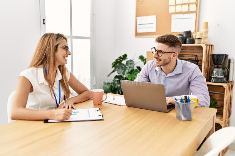 Two Business Workers Smiling Happy Working at the Office Stock Image ...