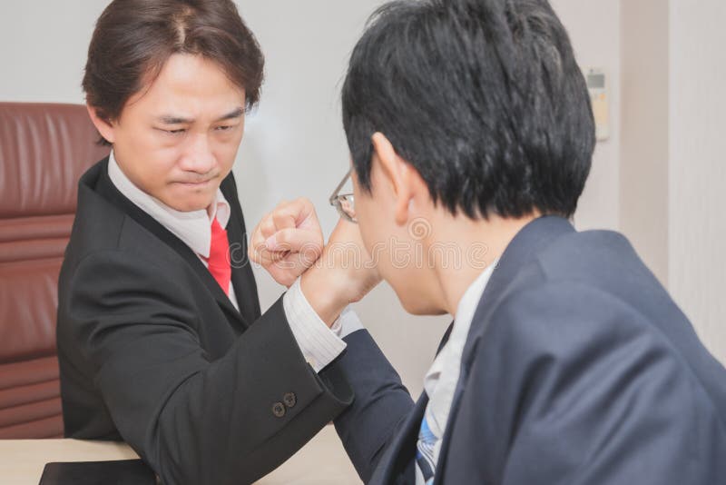 Two Businessman Competing in Arm Wrestling Stock Photo - Image of ...