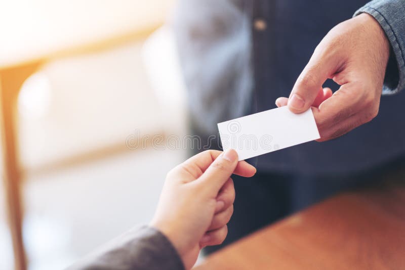 Businessman Exchanging Name Cards with Woman Stock Image - Image of ...