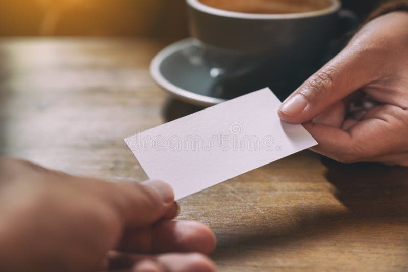 Businessman Exchanging Name Cards with Woman Stock Image - Image of ...