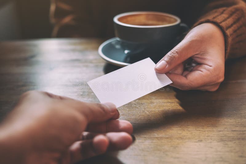 Businessman Exchanging Name Cards with Woman Stock Image - Image of ...