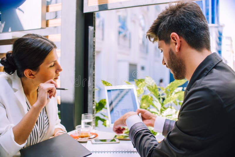 Two Businessman Using Tablet in Meeting Outdoors Stock Image - Image of ...