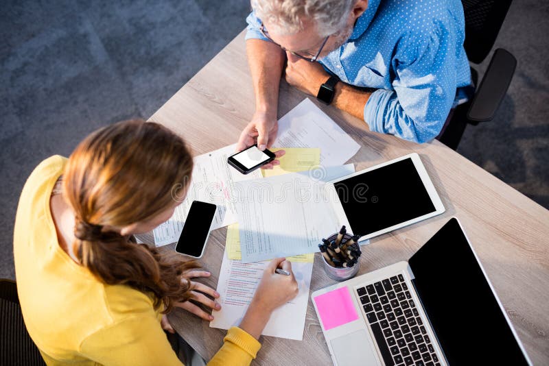 Two Businessmen Analyzing Documents Stock Image - Image of classy ...