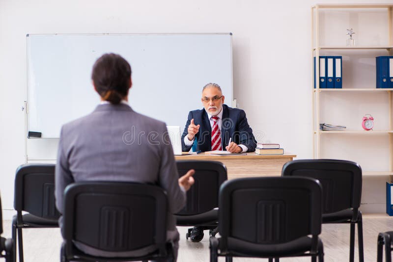 Two Businessmen in the Classroom in Pandemic Concept Stock Image ...