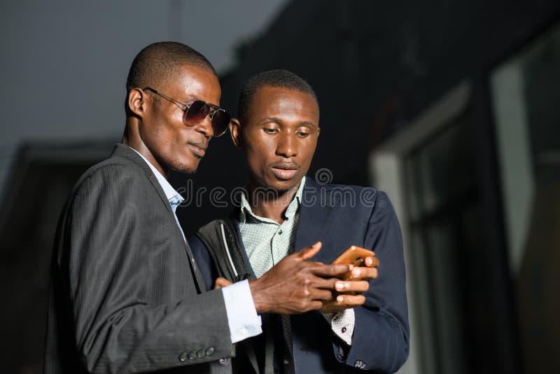 Two Businessmen Discuss Project after Work Stock Photo - Image of ...
