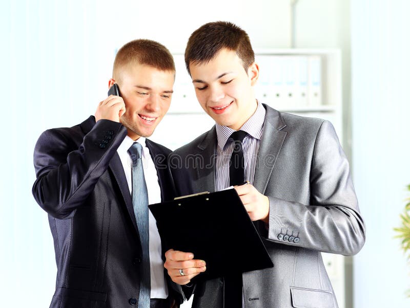 Two businessmen discussing stock photo. Image of people - 29716040