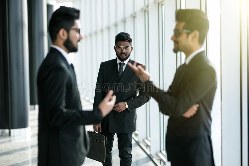 Two Businessmen Discussing at Office during Business Meeting in Front ...