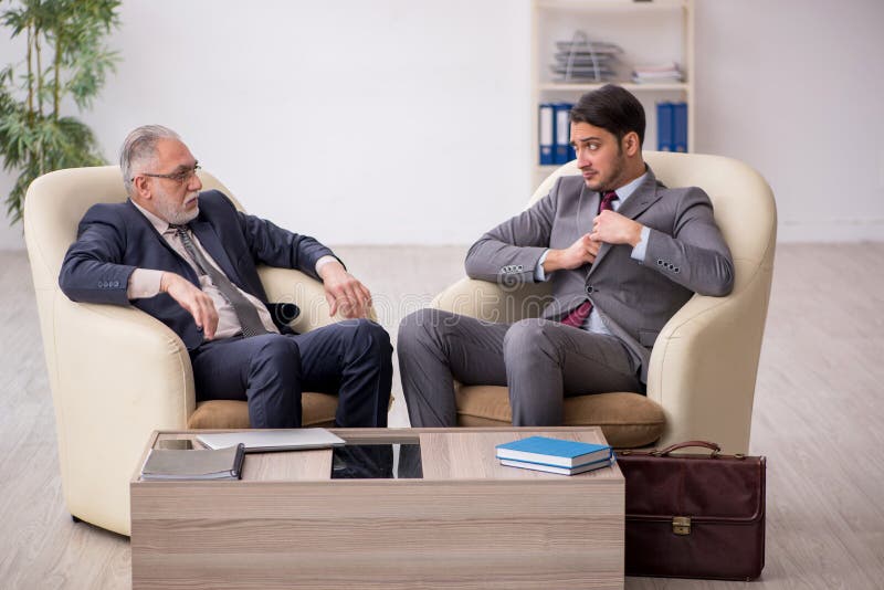 Two Businessmen Discussing Project at Workplace Stock Image - Image of ...