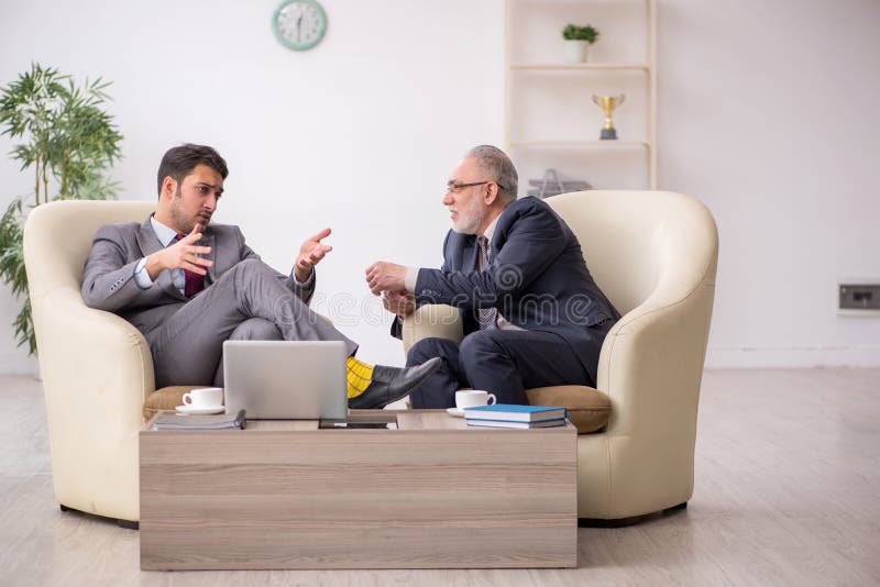 Two Businessmen Discussing Project at Workplace Stock Image - Image of ...