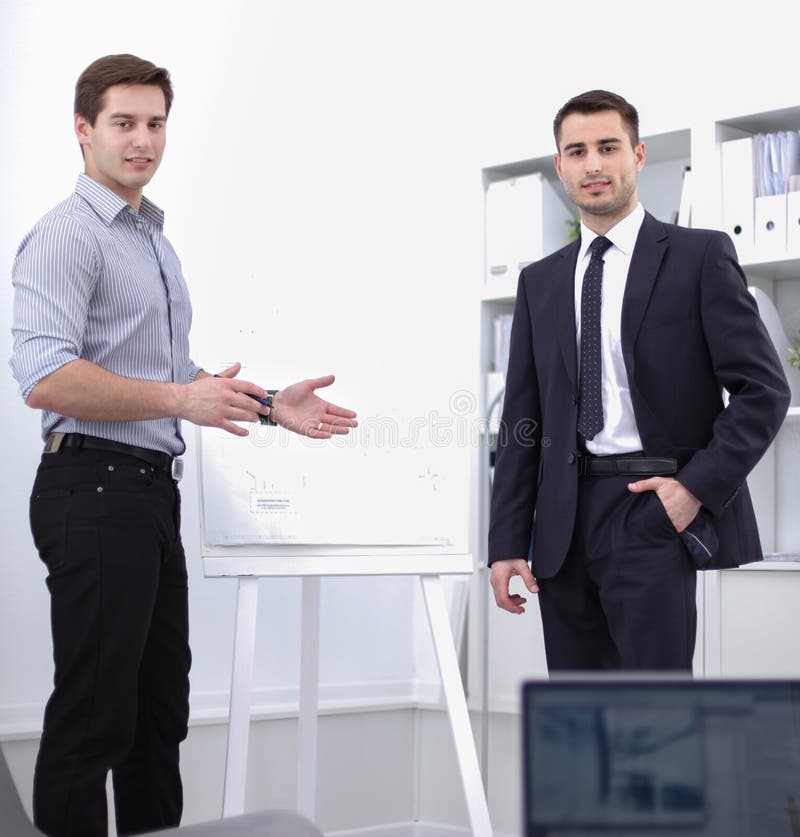 Two Businessmen Discussing Tasks Standing at Office Table Stock Image ...