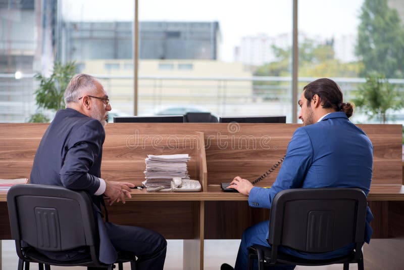 Two Businessmen Employees Working in the Office Stock Photo - Image of ...