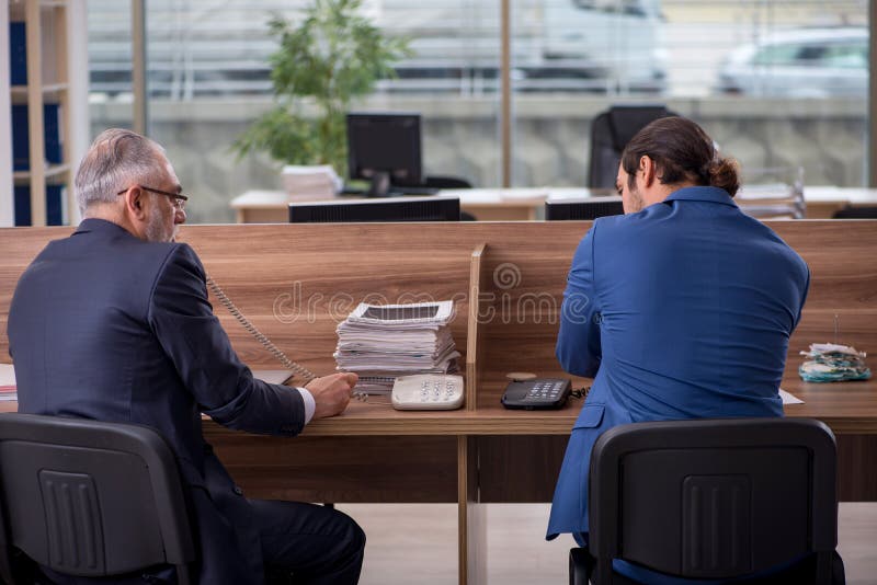 Two Businessmen Employees Working in the Office Stock Image - Image of ...