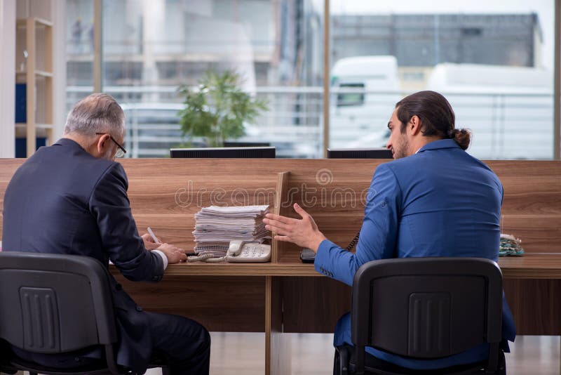 Two Businessmen Employees Working in the Office Stock Photo - Image of ...
