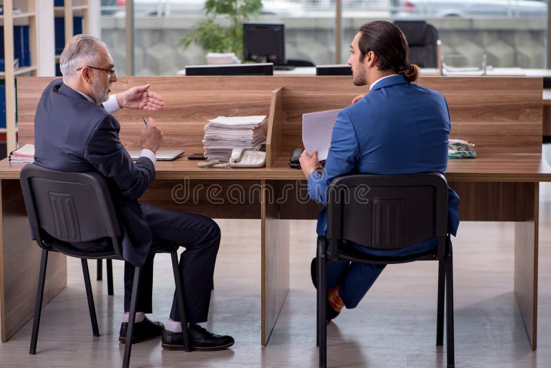 Two Businessmen Employees Working in the Office Stock Photo - Image of ...