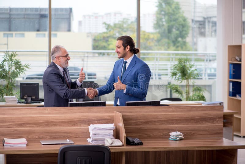 Two Businessmen Employees Working in the Office Stock Photo - Image of ...