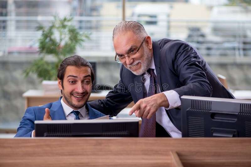 Two Businessmen Employees Working in the Office Stock Photo - Image of ...