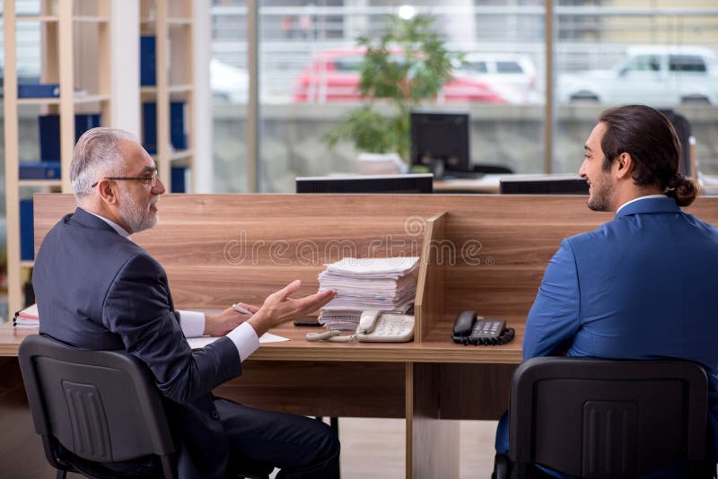 Two Businessmen Employees Working in the Office Stock Image - Image of ...