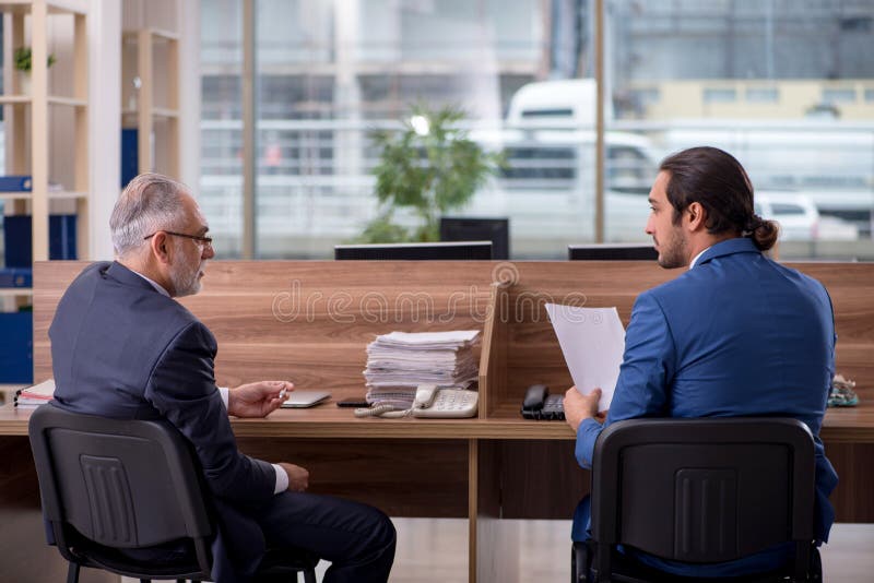 Two Businessmen Employees Working in the Office Stock Photo - Image of ...