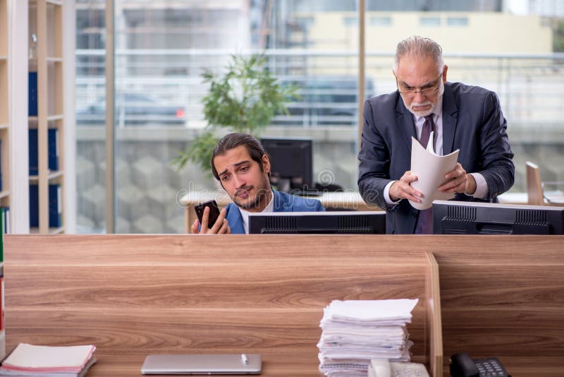 Two Businessmen Employees Working in the Office Stock Photo - Image of ...