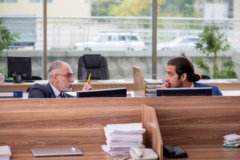 Two Businessmen Employees Working in the Office Stock Photo - Image of ...