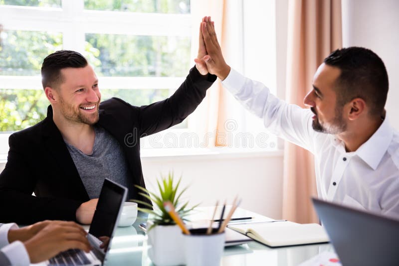 Two Businessmen Giving High Five Stock Image - Image of five, motivated ...
