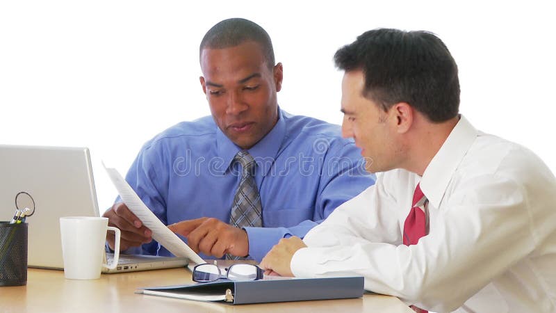 Two Businessmen Going Over Documents Together Stock Video - Video of ...