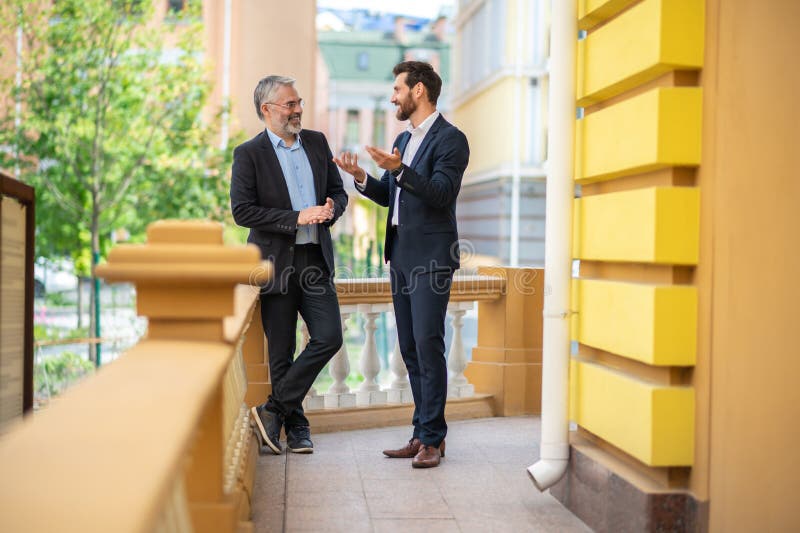 Two Businessmen Having a Conversation Stock Photo - Image of project ...