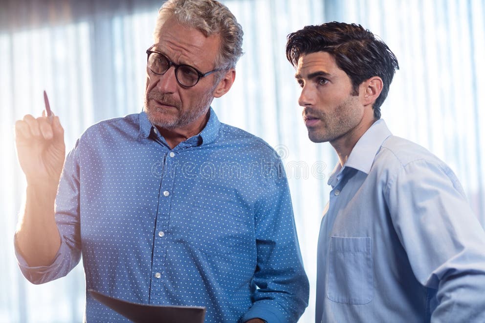 Two Businessmen Interacting Stock Image - Image of discussion, business ...