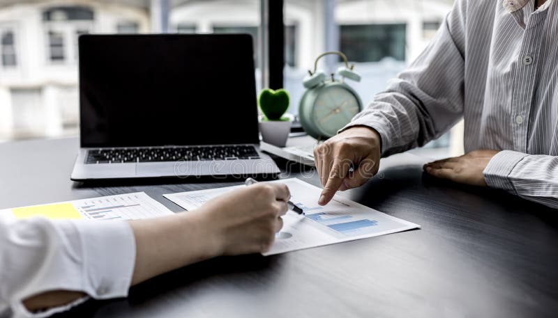 Two Businessmen Pointed To the Material for the Meeting, Working ...