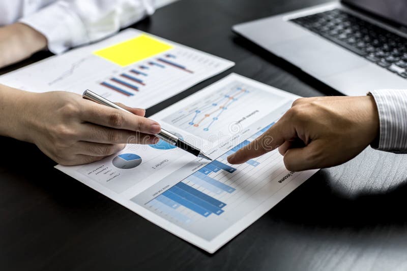 Two Businessmen Pointed To the Material for the Meeting, Working ...