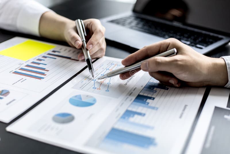 Two Businessmen Pointed To the Material for the Meeting, Working ...