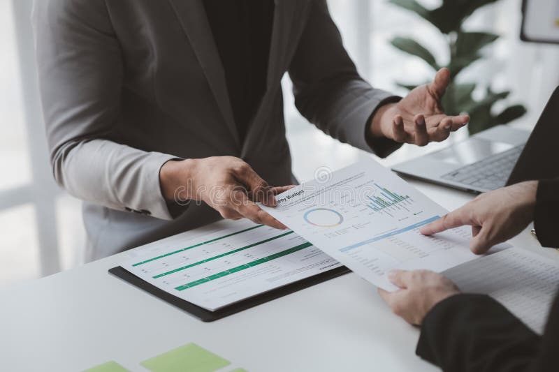 Two Businessmen Pointed To the Material for the Meeting, Working ...