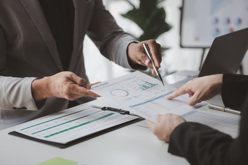 Two Businessmen Pointed To the Material for the Meeting, Working ...