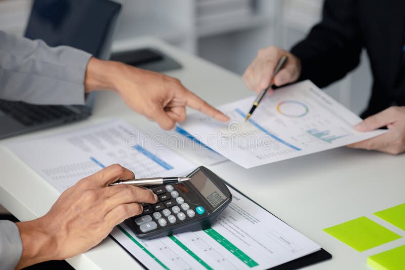 Two Businessmen Pointed To the Material for the Meeting, Working ...