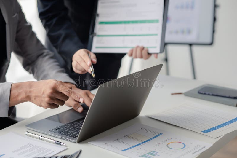 Two Businessmen Pointed To the Material for the Meeting, Working ...