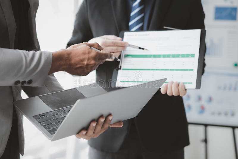 Two Businessmen Pointed To the Material for the Meeting, Working ...