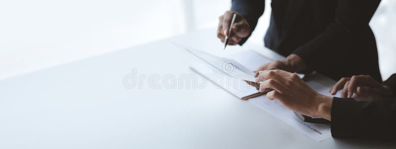 Two Businessmen Pointed To the Material for the Meeting, Working ...
