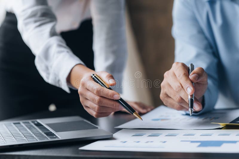 Two Businessmen Pointed To the Material for the Meeting, Working ...