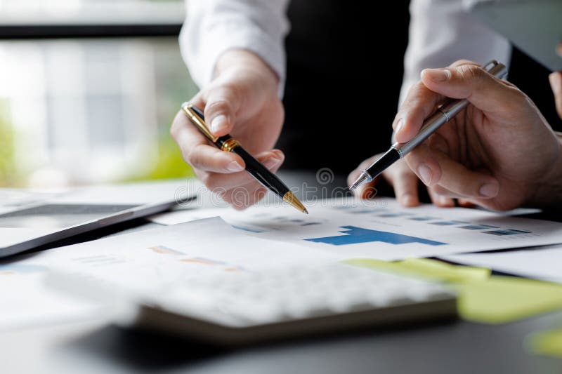 Two Businessmen Pointed To the Material for the Meeting, Working ...