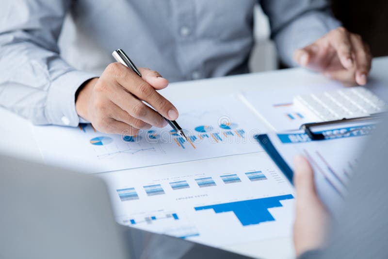 Two Businessmen Pointed To the Material for the Meeting, Working ...