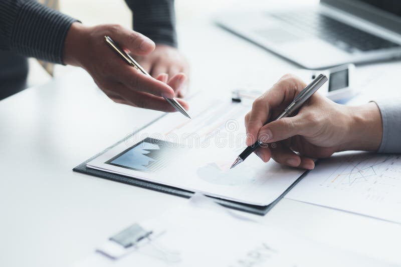 Two Businessmen Pointed To the Material for the Meeting, Working ...