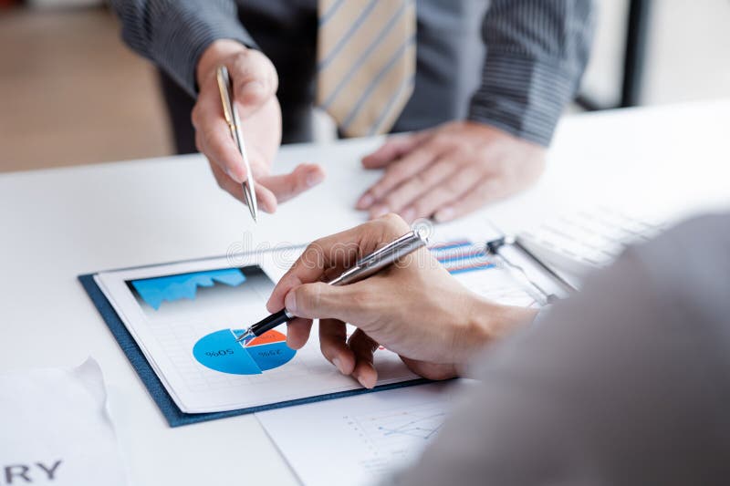 Two Businessmen Pointed To the Material for the Meeting, Working ...