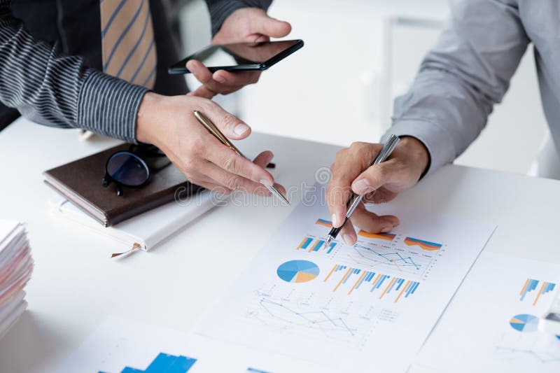 Two Businessmen Pointed To the Material for the Meeting, Working ...