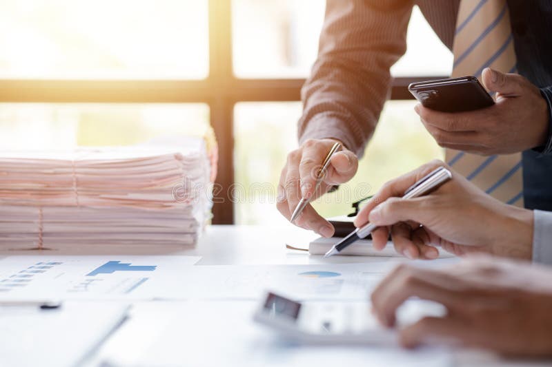 Two Businessmen Pointed To the Material for the Meeting, Working ...