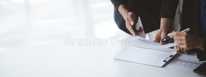 Two Businessmen Pointed To the Material for the Meeting, Working ...