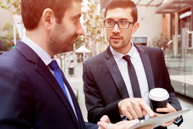 Two Businessmen Talking Outdoors Stock Image - Image of discussion ...
