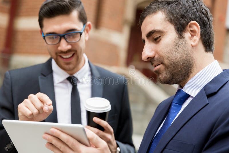 Two Businessmen Talking Outdoors Stock Photo - Image of suit ...